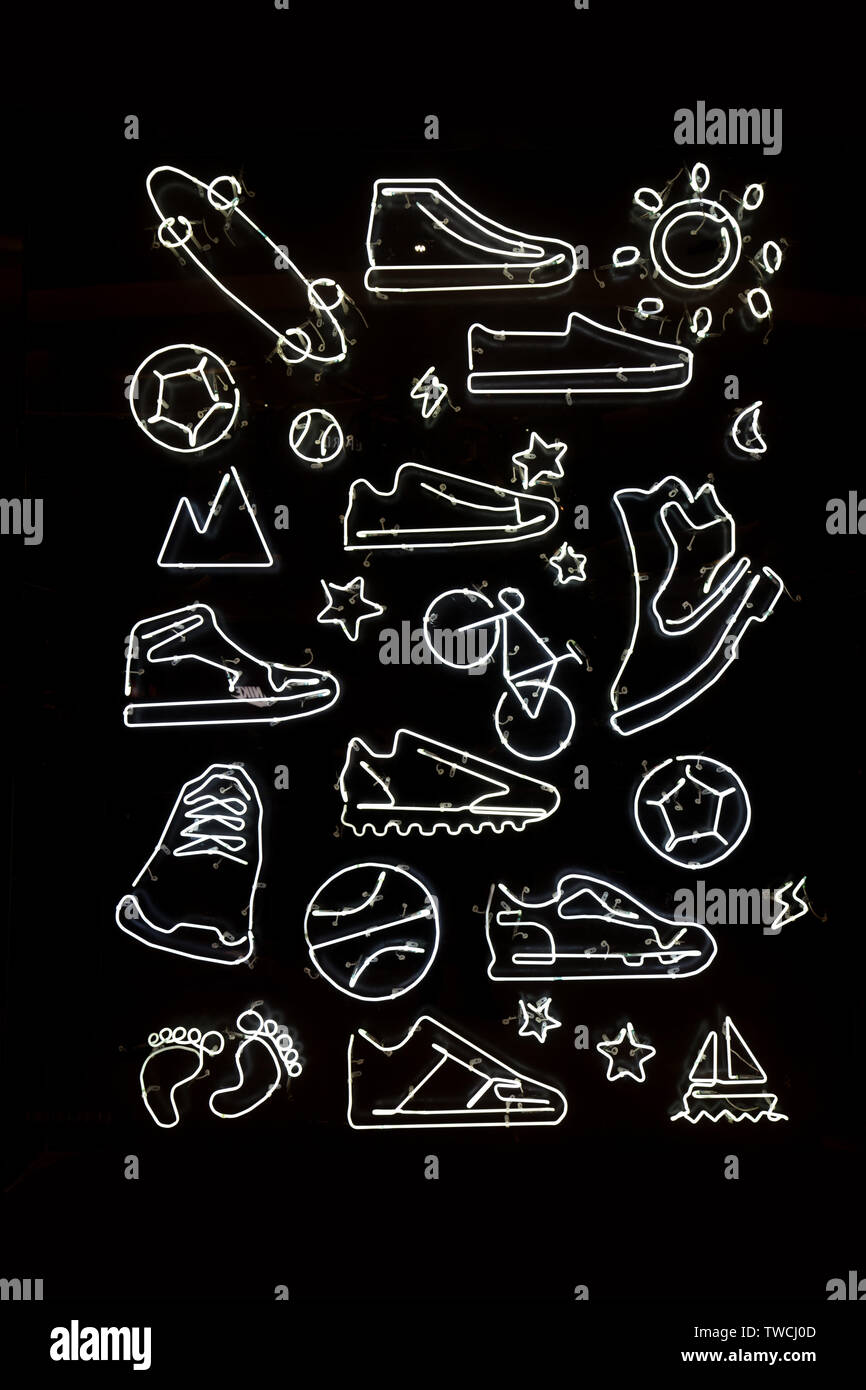 wall with abstract signs in modern shopping mall Stock Photo - Alamy