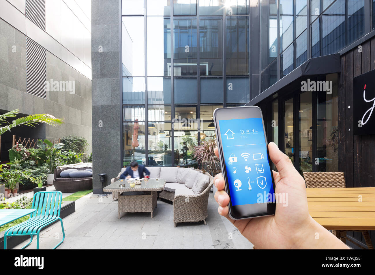 smart phone with smart home with relaxation place Stock Photo - Alamy