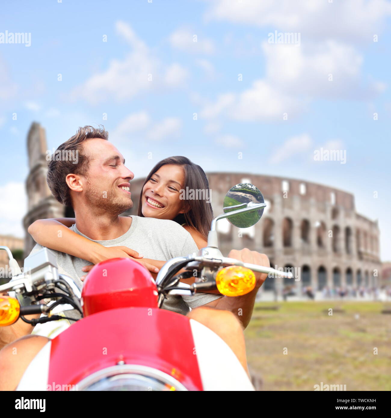 Rome couple on scooter by Colosseum, Italy. Romantic happy lovers ...