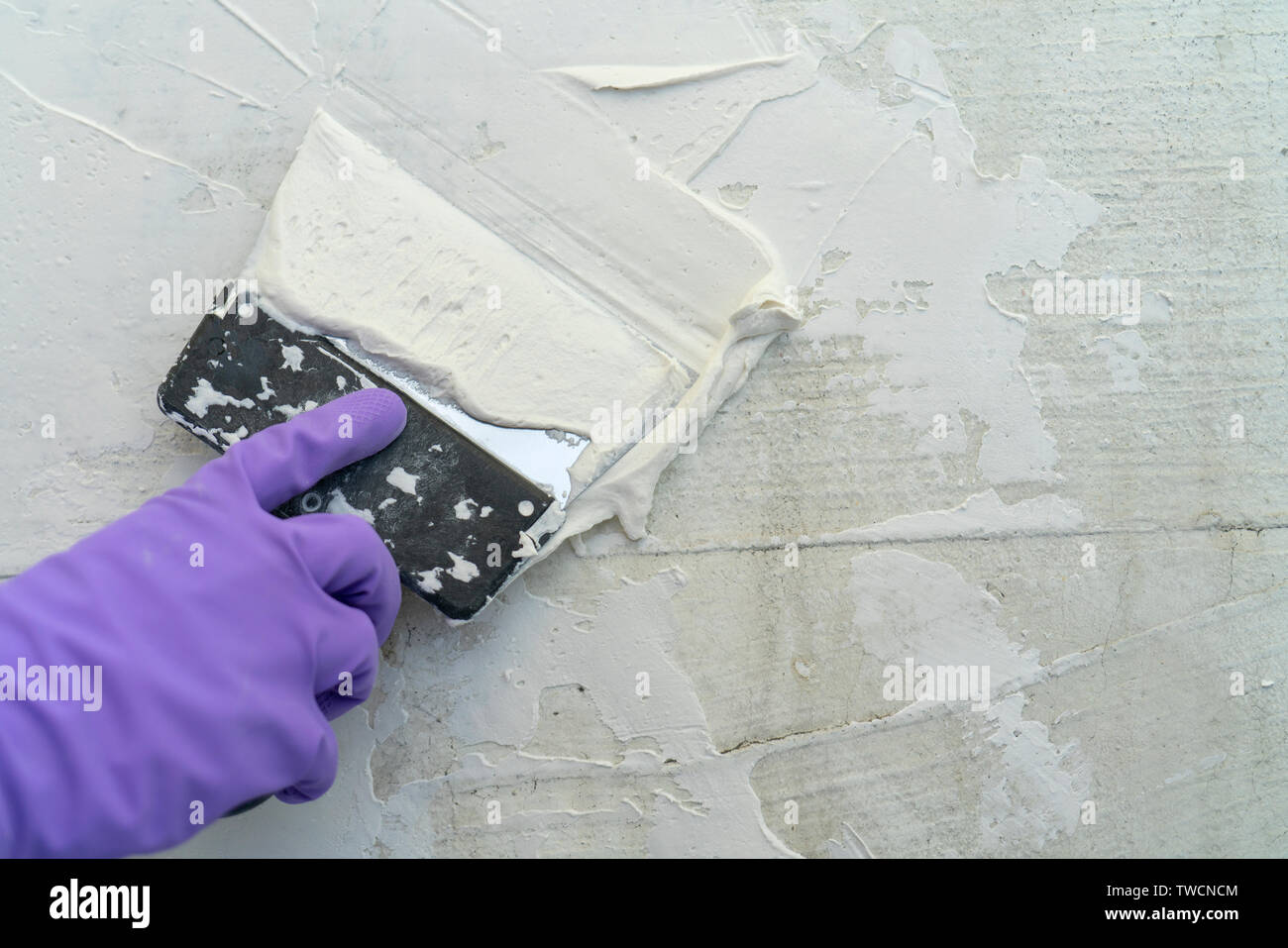 Texture of white plaster. Covering the concrete wall of the house ...