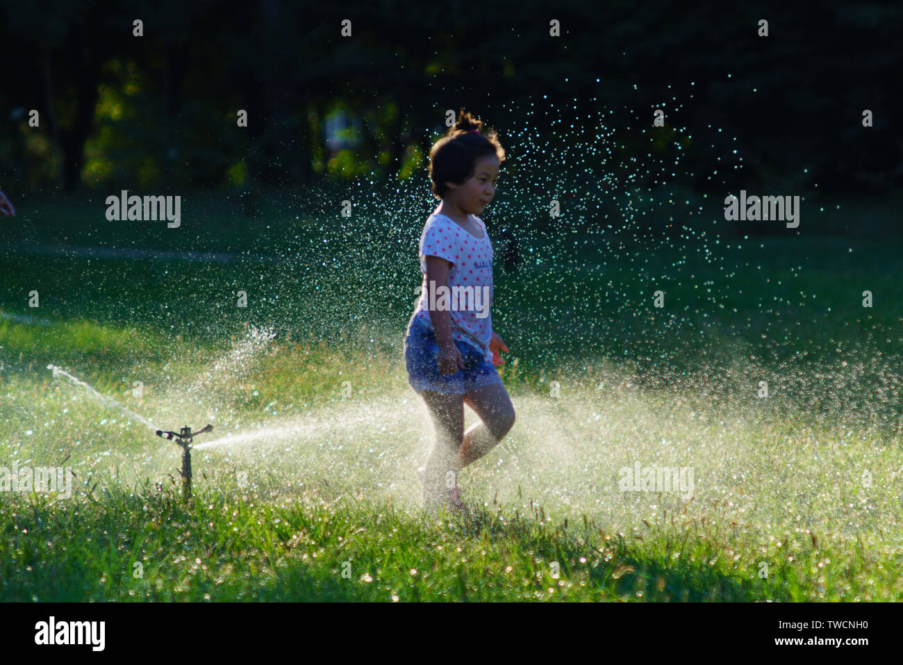 Playing water, children's fun Stock Photo - Alamy