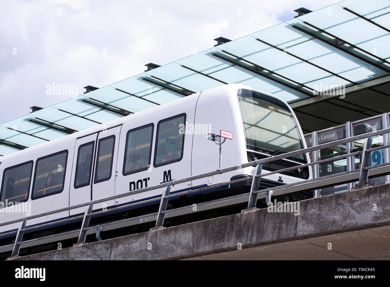 Driverless train in automated metro system. Train enters a metro ...