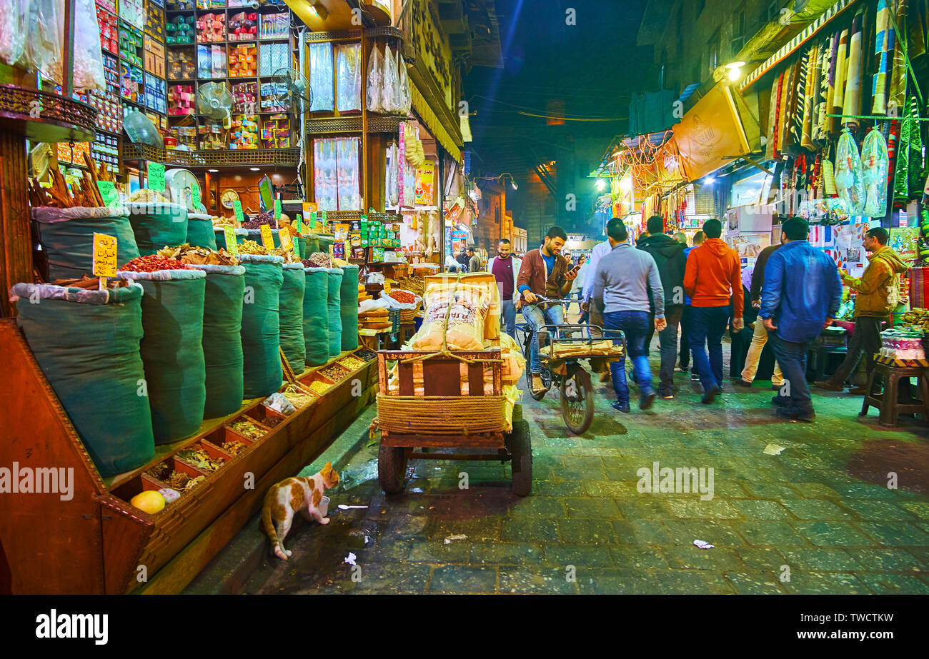 CAIRO, EGYPT - DECEMBER 22, 2017: The narrow busy street of Khan EL ...