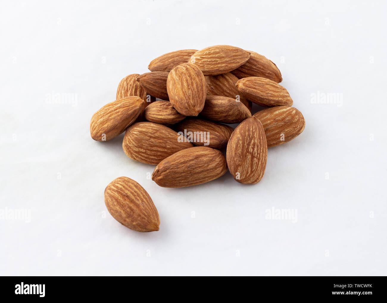 group of almonds without shells on white background Stock Photo - Alamy