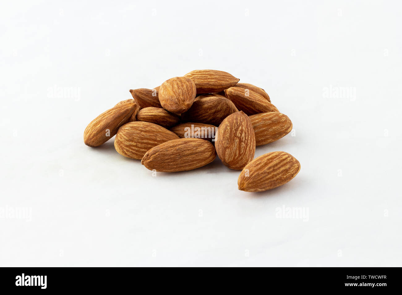 group of almonds without shells on white background Stock Photo - Alamy
