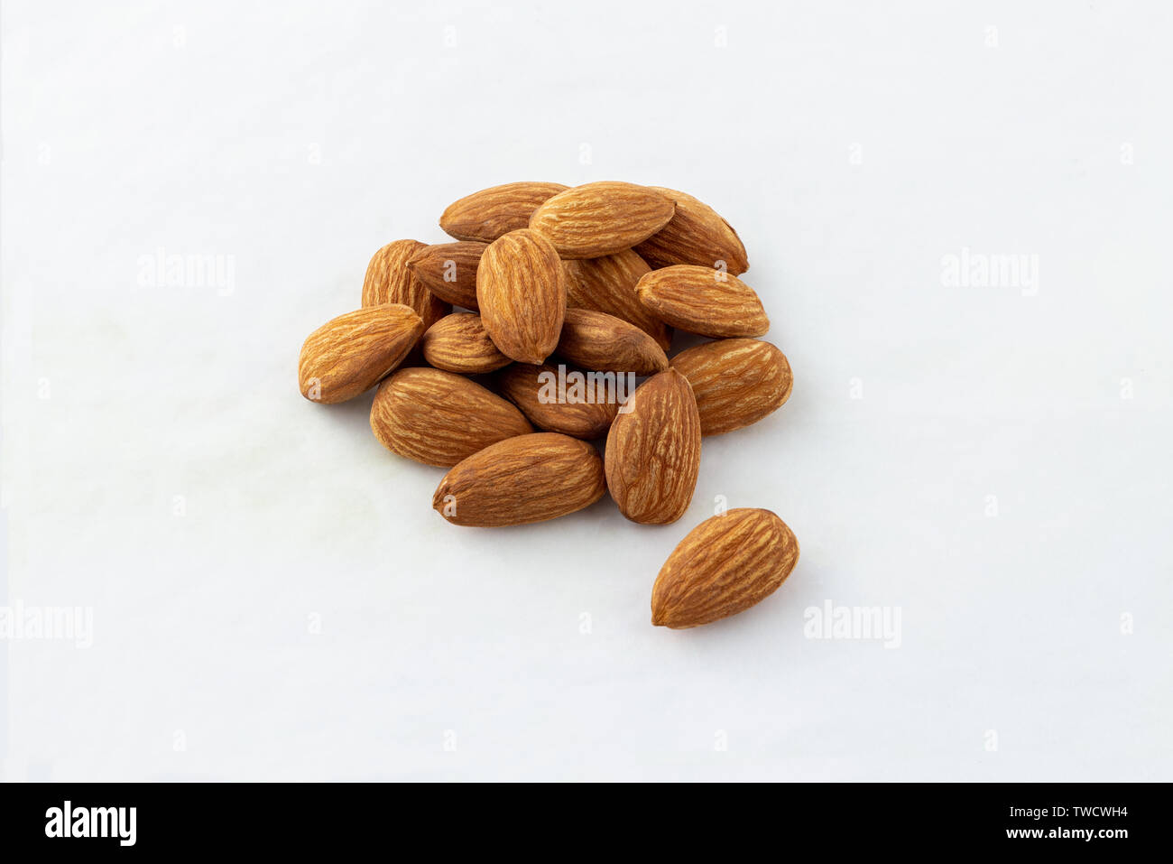 group of almonds without shells on white background Stock Photo - Alamy