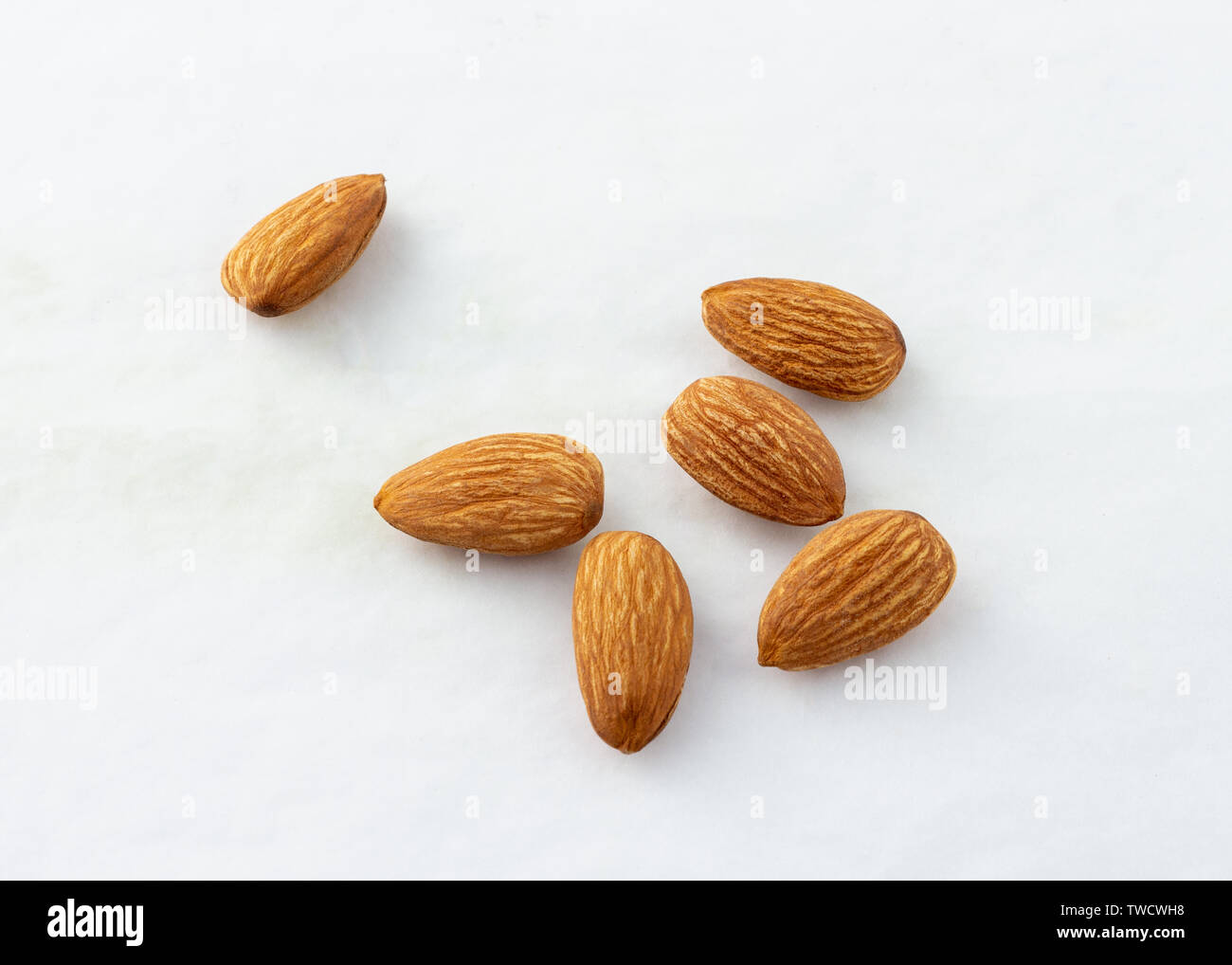 group of almonds without shells on white background Stock Photo - Alamy