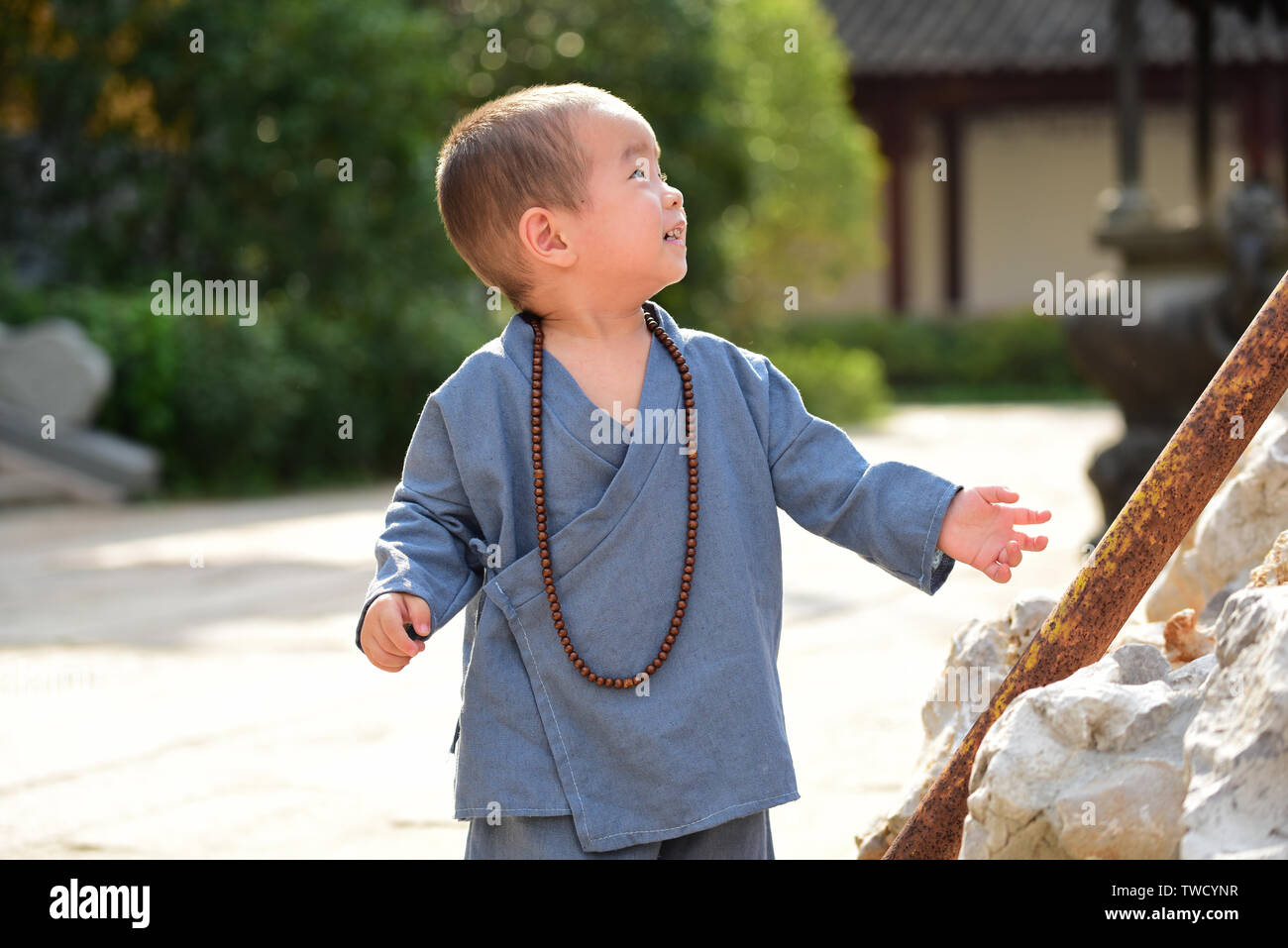Cute little monk Stock Photo - Alamy