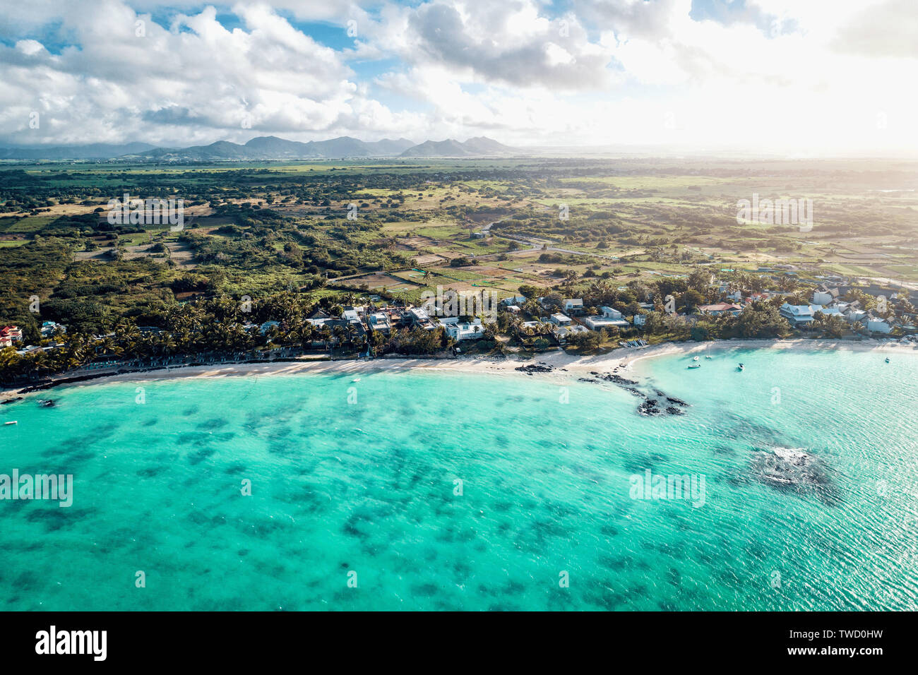Aerial drone view at luxury resorts and coastline at Belle Mare beach ...