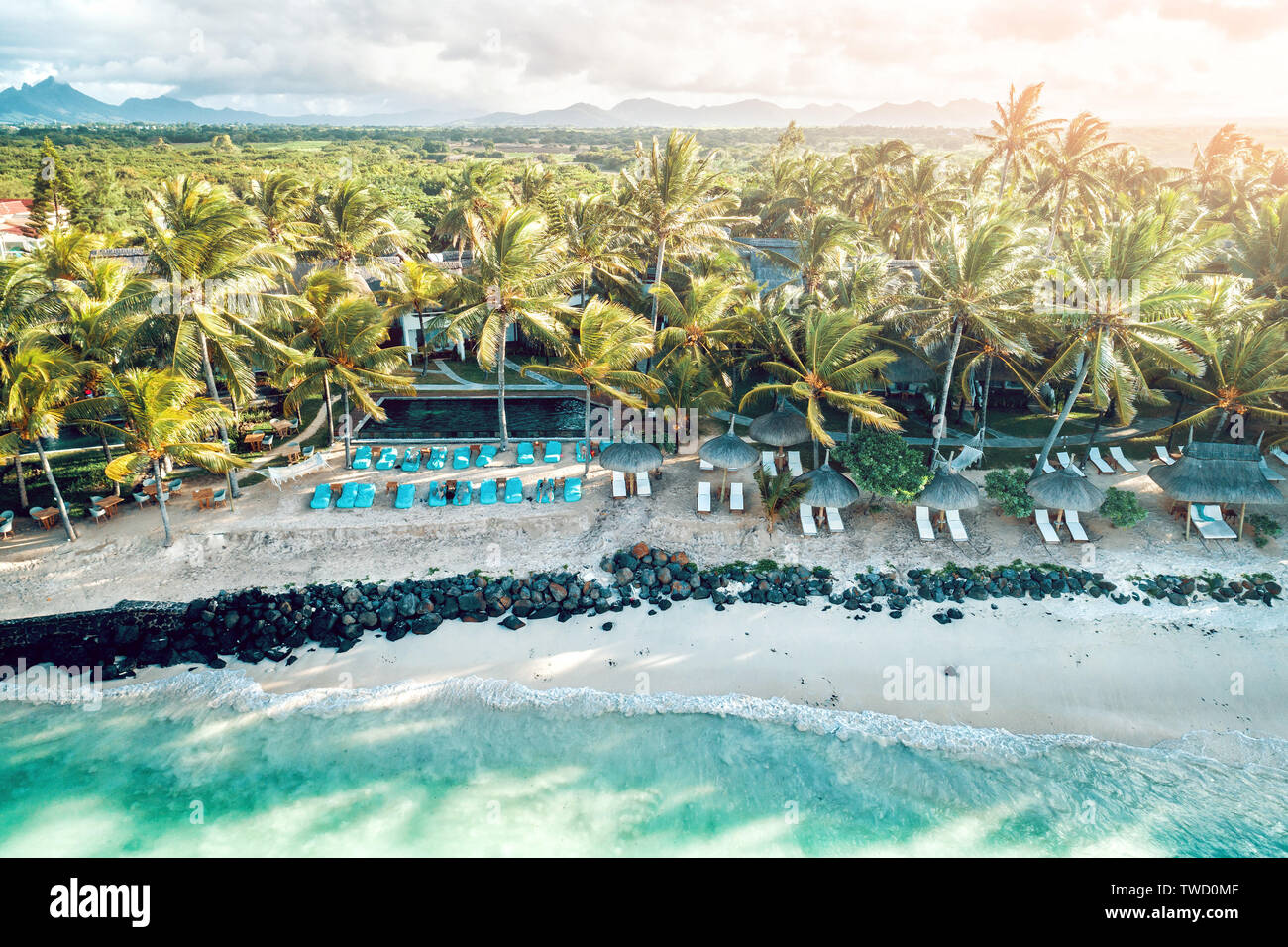 Aerial drone view at luxury resorts and coastline at Belle Mare beach ...