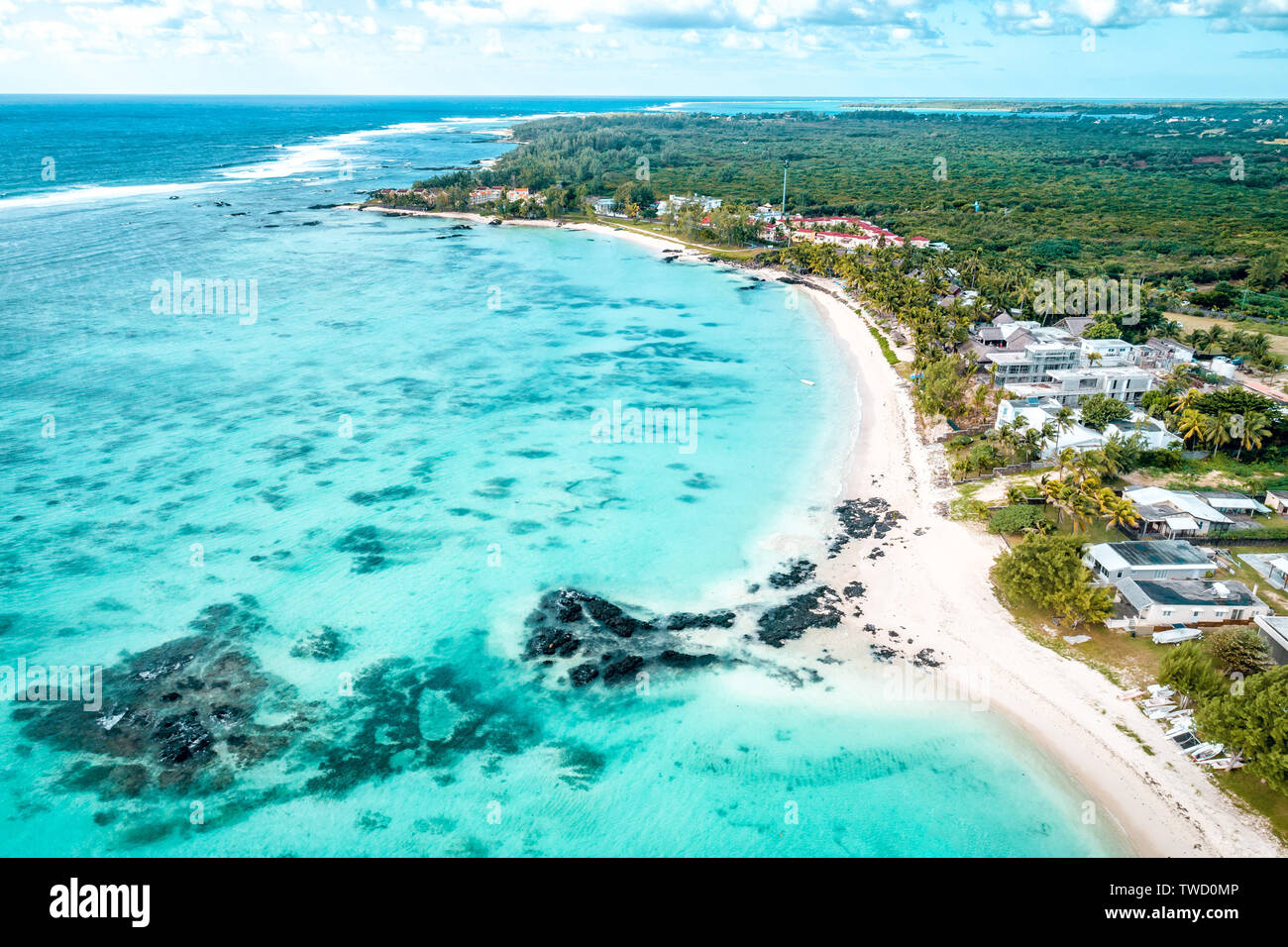 Aerial drone view at luxury resorts and coastline at Belle Mare beach ...
