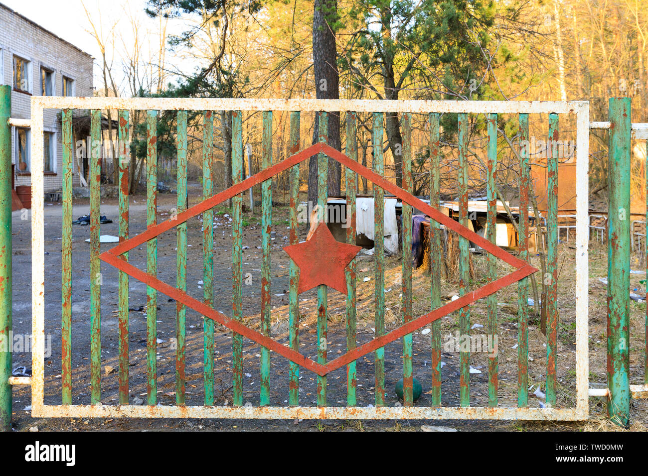 Eastern Europe, Ukraine, Pripyat, Chernobyl. Gate with soviet star ...