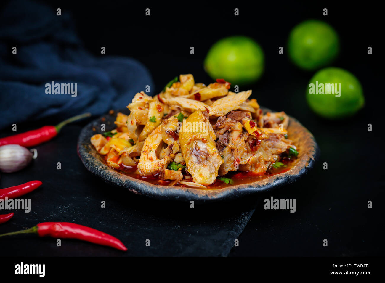 drooling chicken, stick chicken Stock Photo - Alamy
