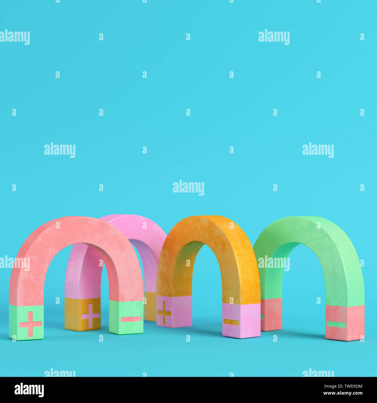 Four colorful magnets on bright blue background in pastel colors ...