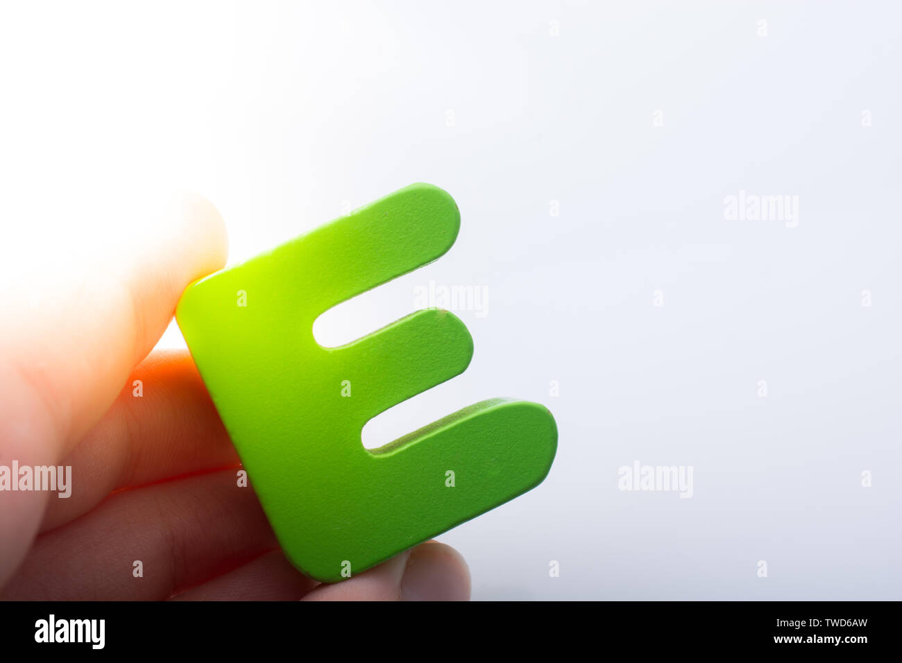 Letter cube of E of Alphabet made of wood Stock Photo - Alamy