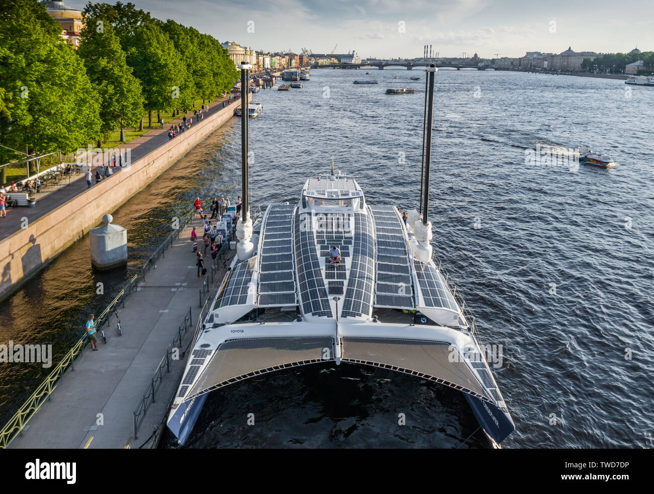 The French Catamaran Energy Observer against sights of the city ...