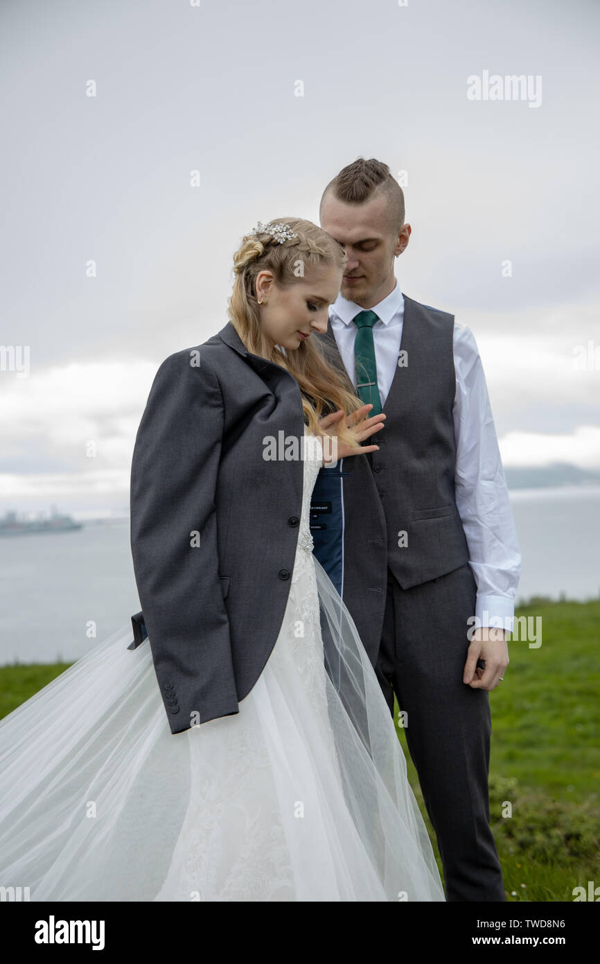 Cold bride wears the grooms jacket at her Wedding, Jennycliff, Plymouth ...
