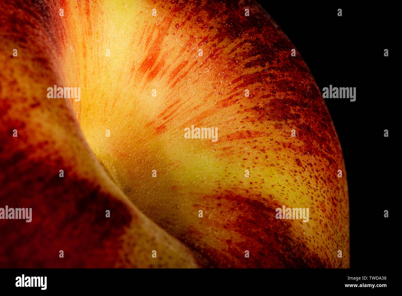 Macro of the top section of a peach with a deep depth of field on a ...