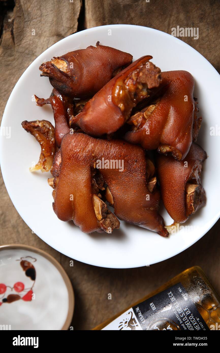 Delicious roasted pig's hoof food Stock Photo - Alamy