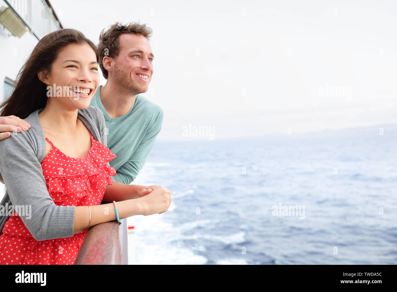 Cruise ship couple romantic on boat looking at view in romance. Happy ...