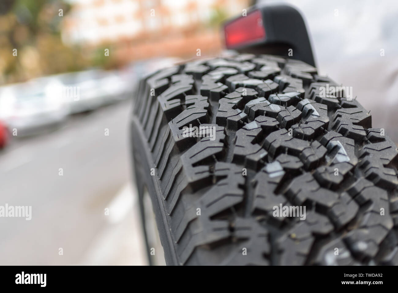 New off-road car tire Stock Photo - Alamy