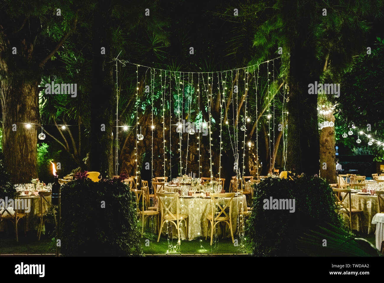 Beautiful decoration for a night wedding, illuminated with led lanterns ...