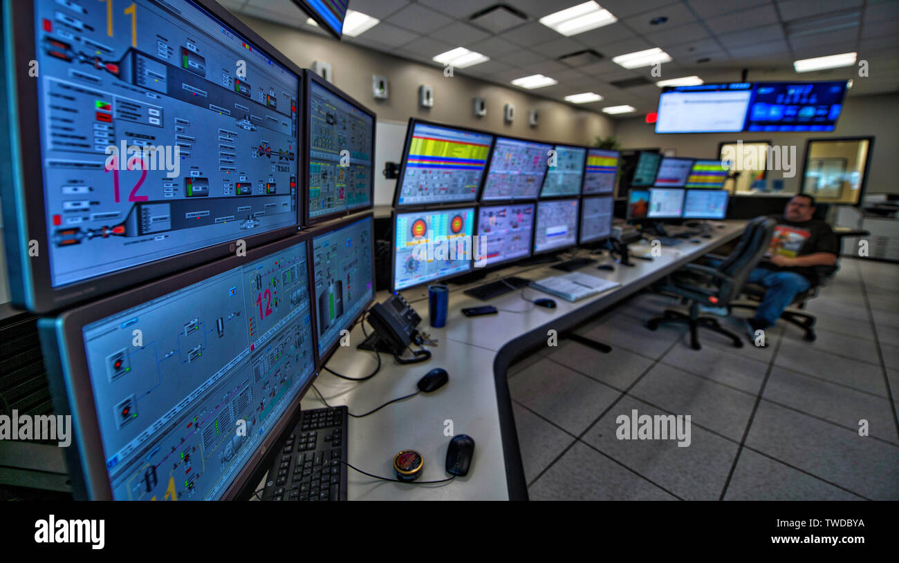 UNITED STATES - August 31, 2017: A employee monitors screens in the ...