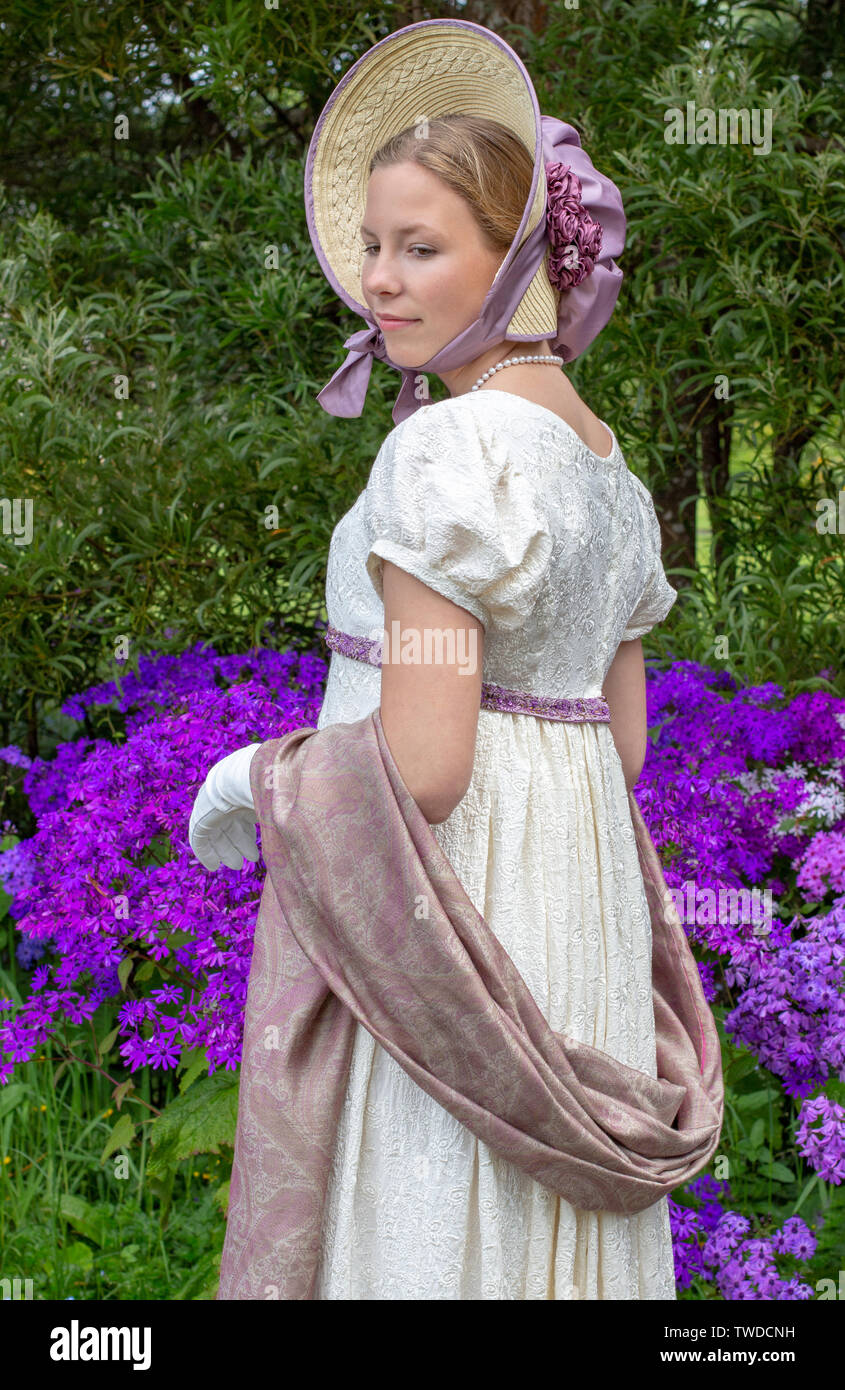 Regency woman in cream dress on studio backdrop Stock Photo - Alamy