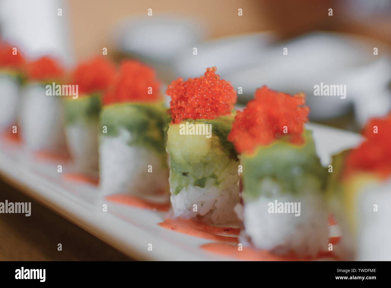 Crab seed avocado sushi Stock Photo - Alamy