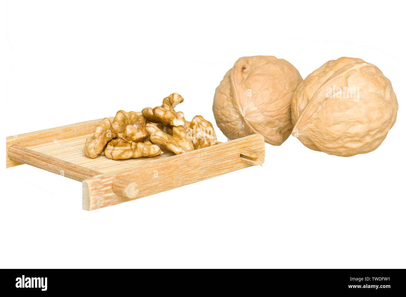 Walnuts in there shells Cut Out Stock Images & Pictures - Alamy
