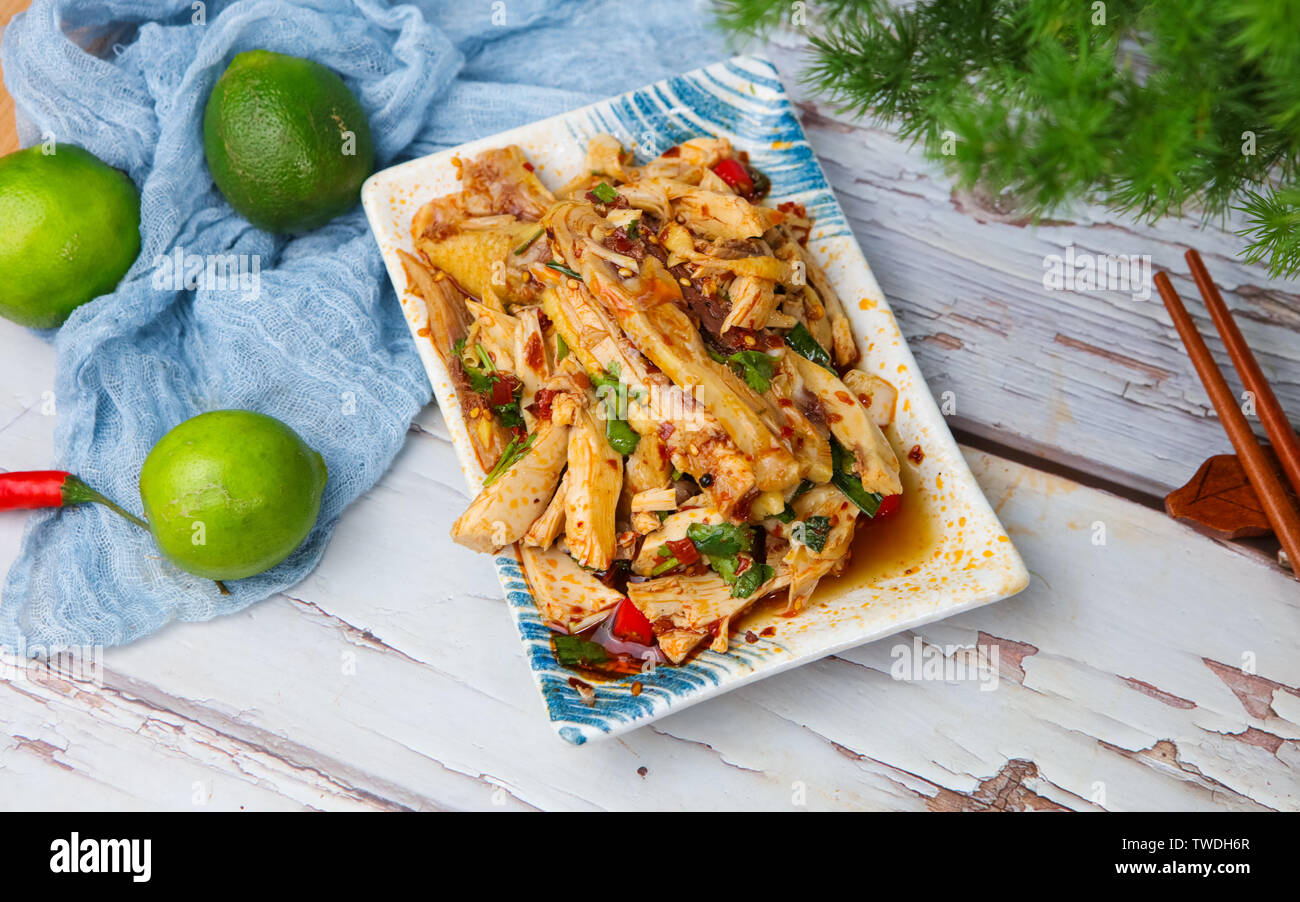 drooling chicken, stick chicken Stock Photo - Alamy