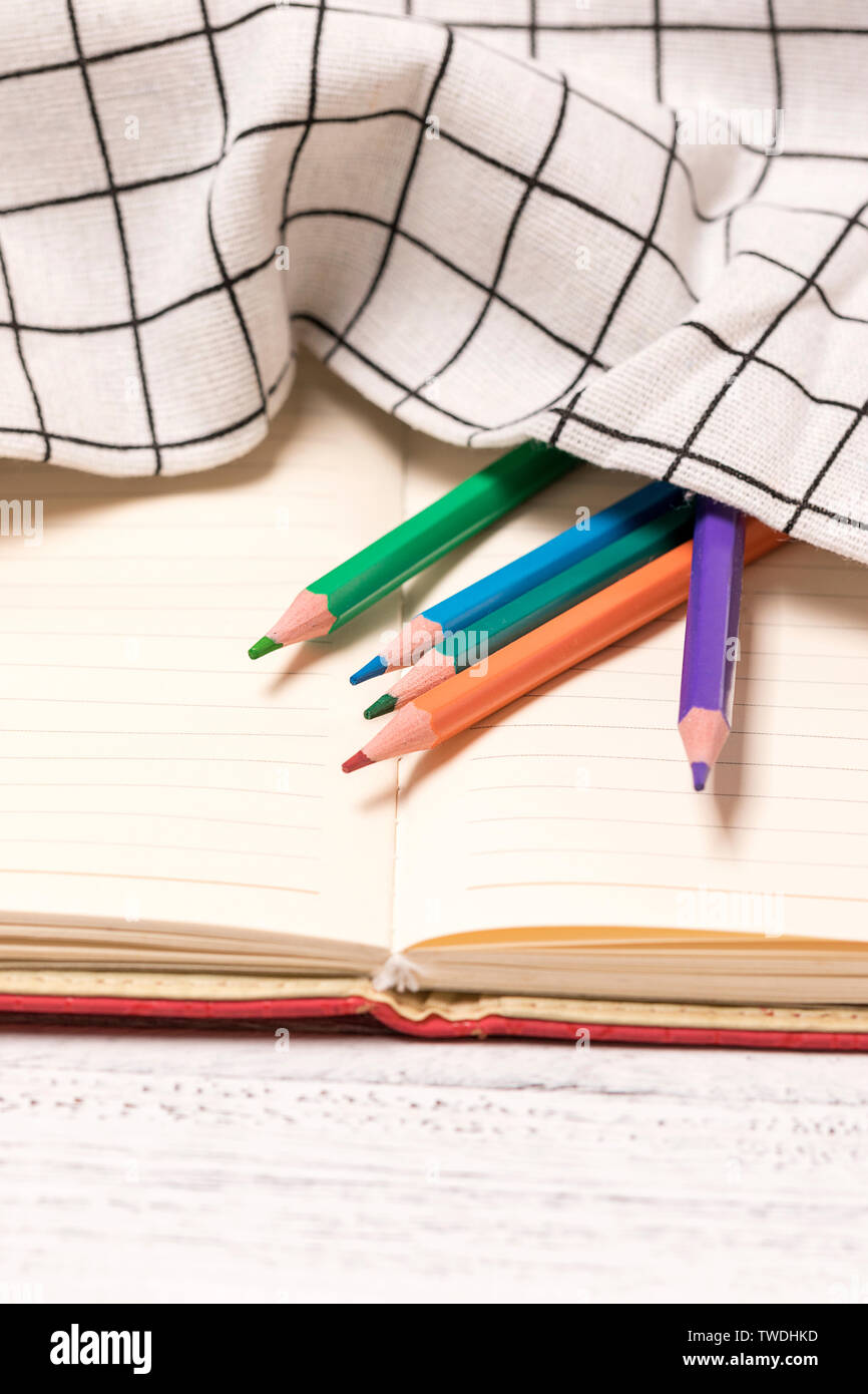 Colorful pencils and notebooks Stock Photo - Alamy