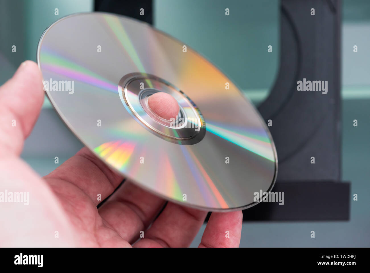 Hand holding cd hi-res stock photography and images - Alamy