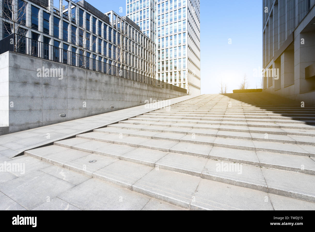 empty footpath between modern building with sunbeam Stock Photo - Alamy