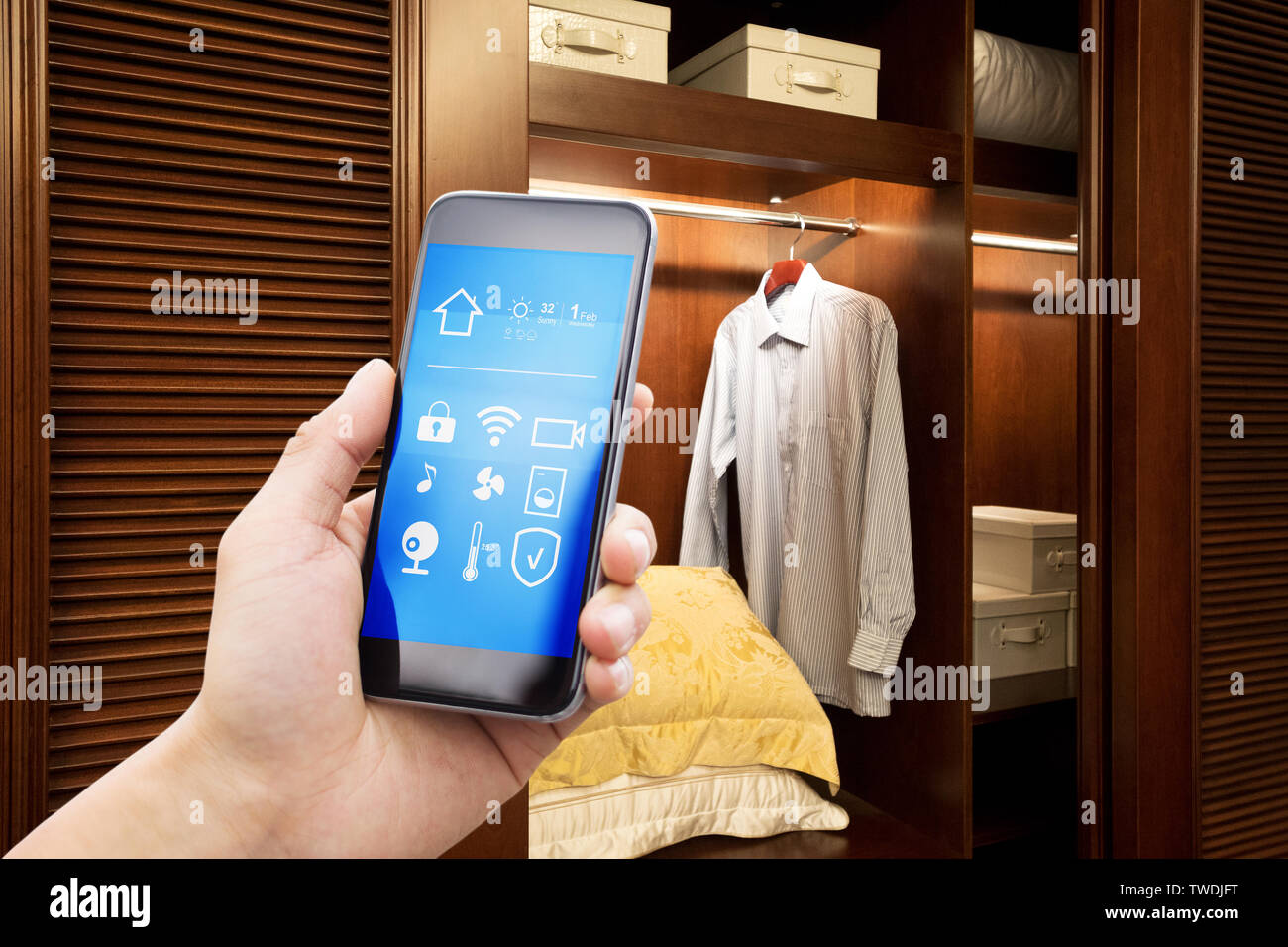 mobile phone with smart home with modern closet Stock Photo - Alamy