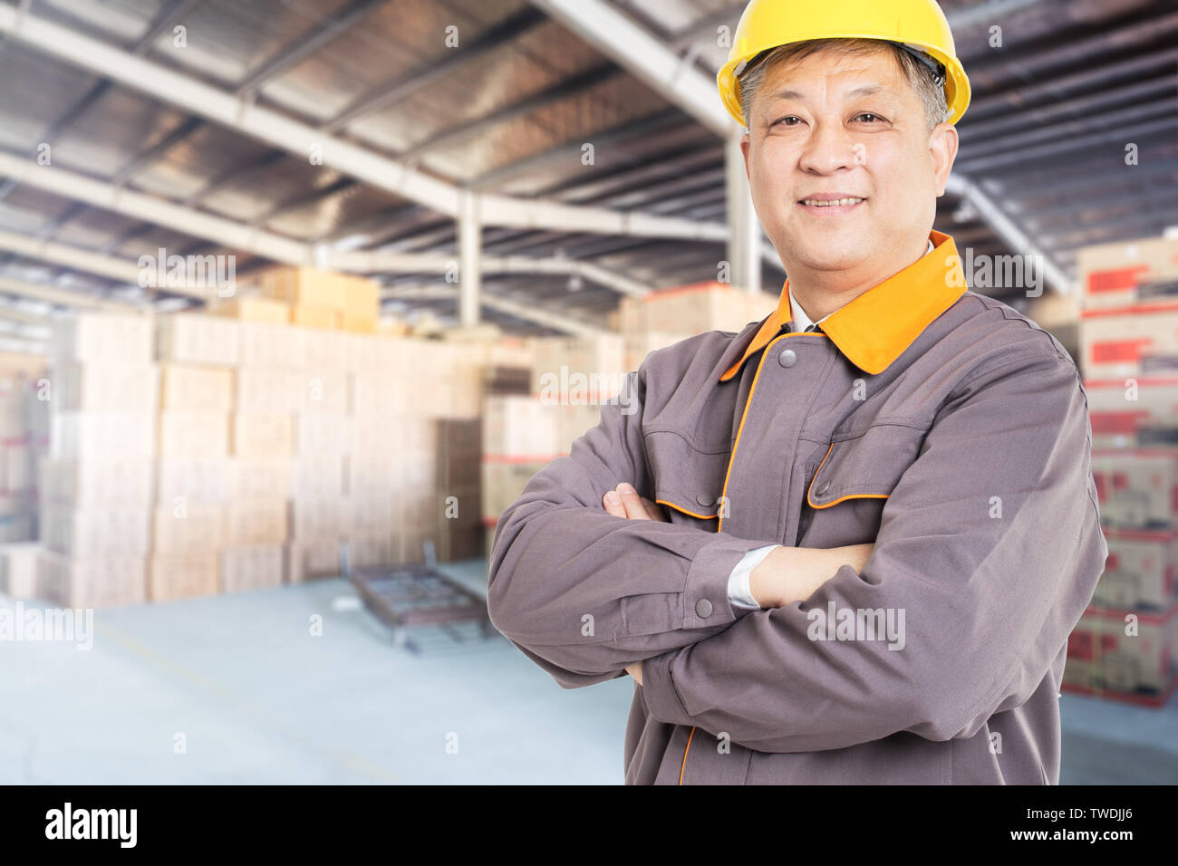 old asian man engineer in modern factory Stock Photo - Alamy