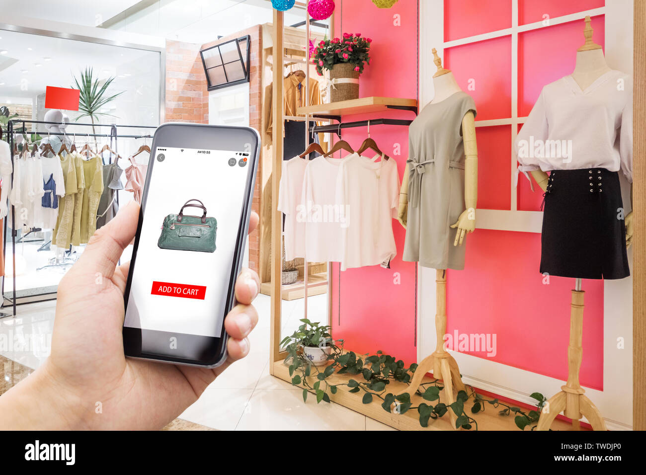 Smartphone with modern shopping mall Stock Photo - Alamy