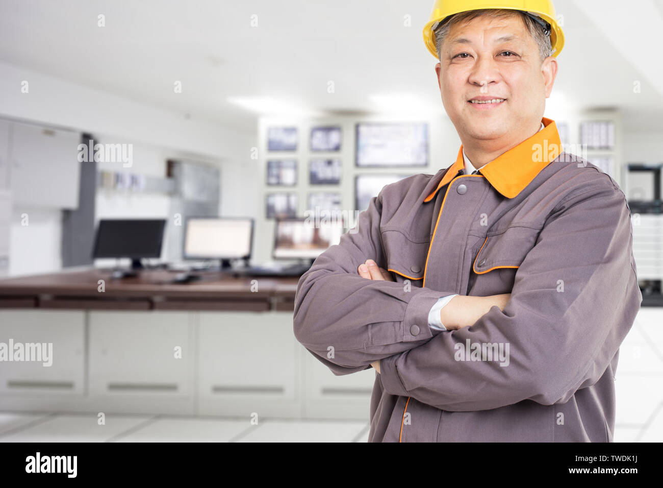 old asian man engineer in modern factory Stock Photo - Alamy