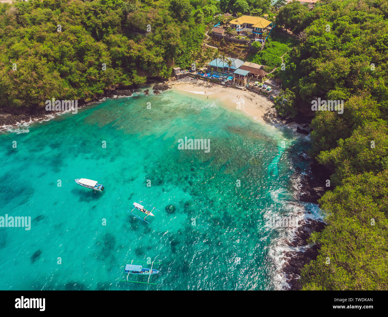 Sea bay with turquoise water and a small white beach. Beautiful lagoon ...