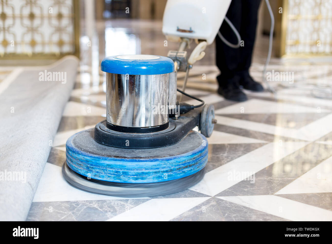 man polishing marble floor in modern office building Stock Photo - Alamy
