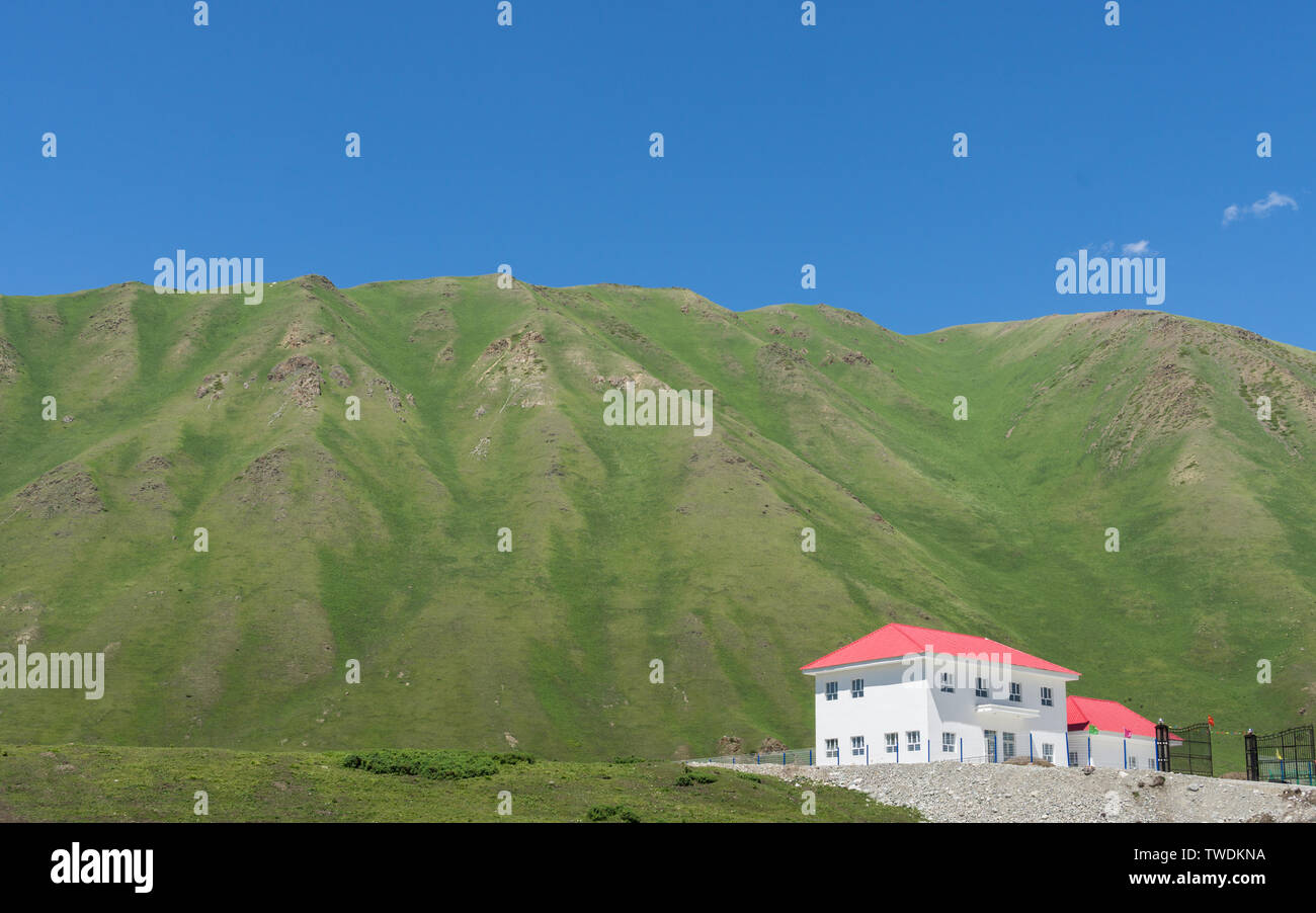 Alpine prairie houses on a sunny summer day Stock Photo - Alamy