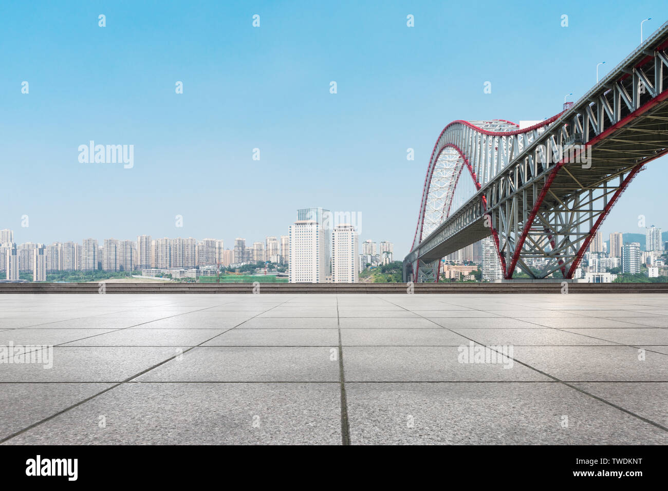 empty floor with steel bridge in modern city Stock Photo - Alamy