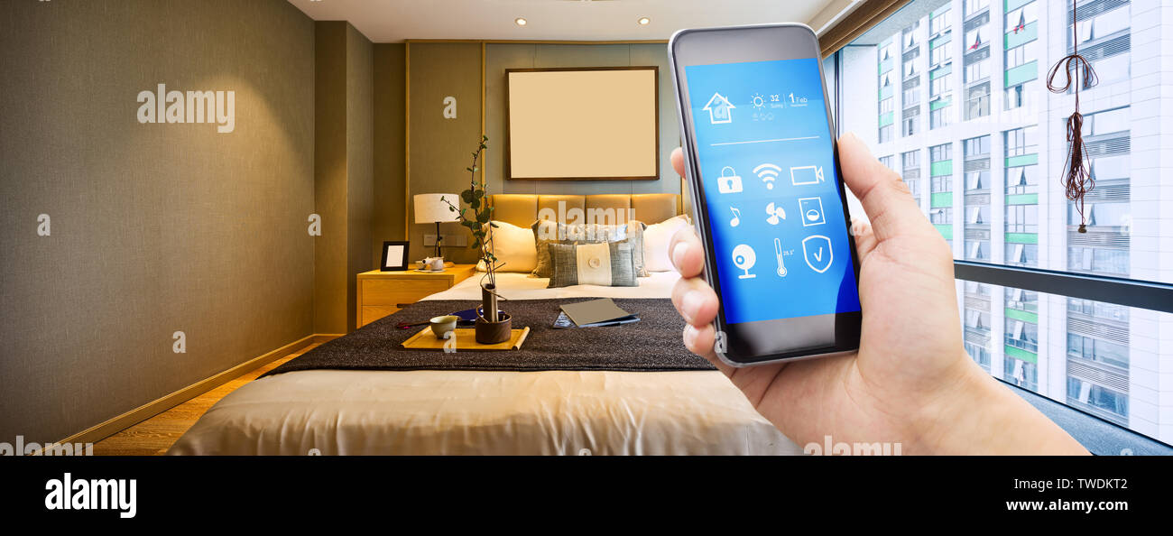 smart phone with smart home with modern bedroom Stock Photo - Alamy