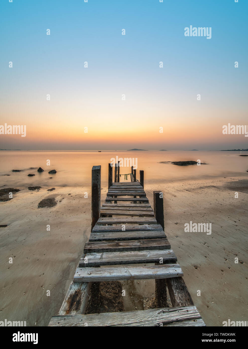 The wooden trestle of the seaside wharf Stock Photo - Alamy
