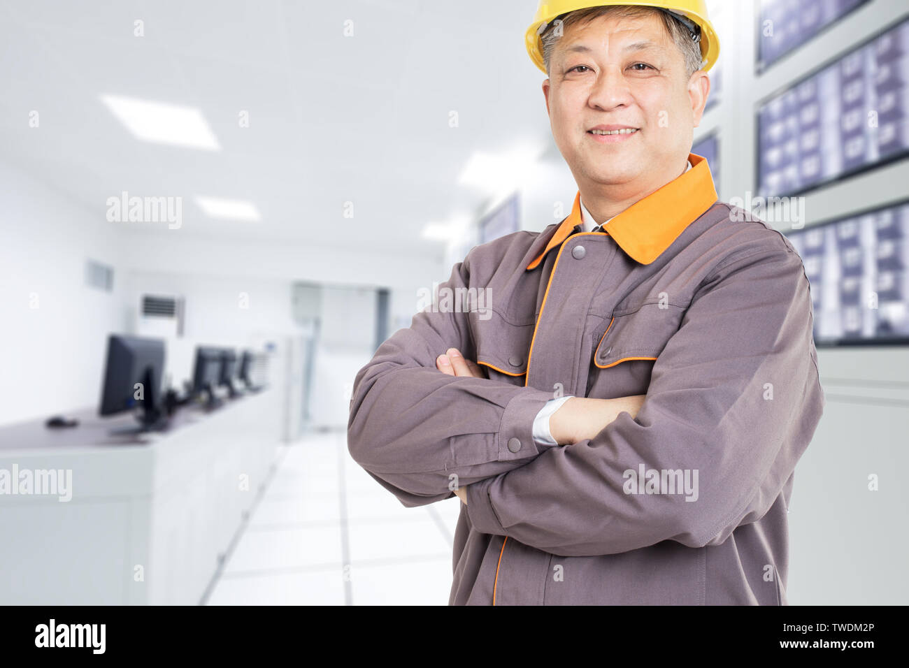 old asian man engineer in modern factory Stock Photo - Alamy