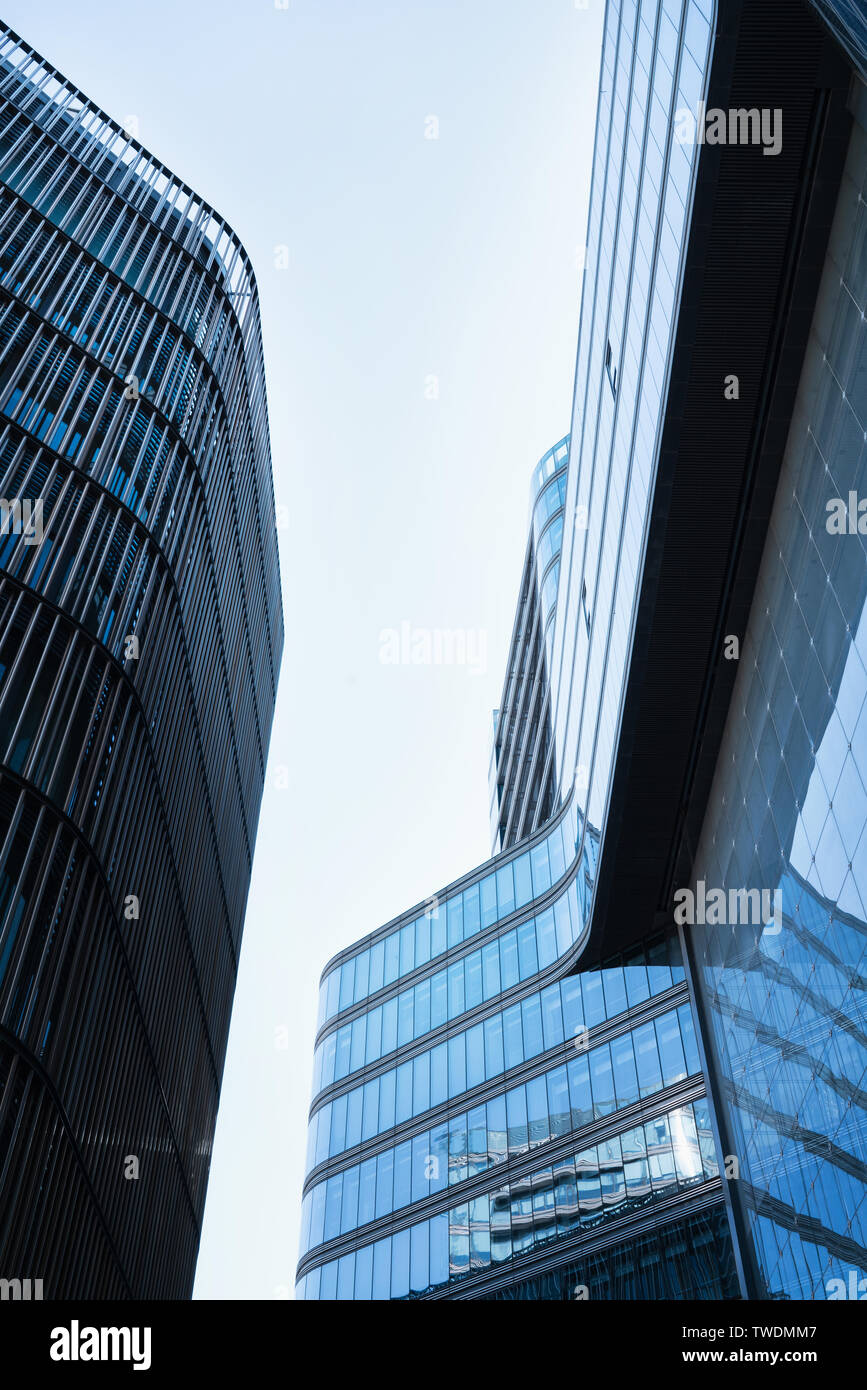 high-rise building buildings looking up at the angle of the city ...