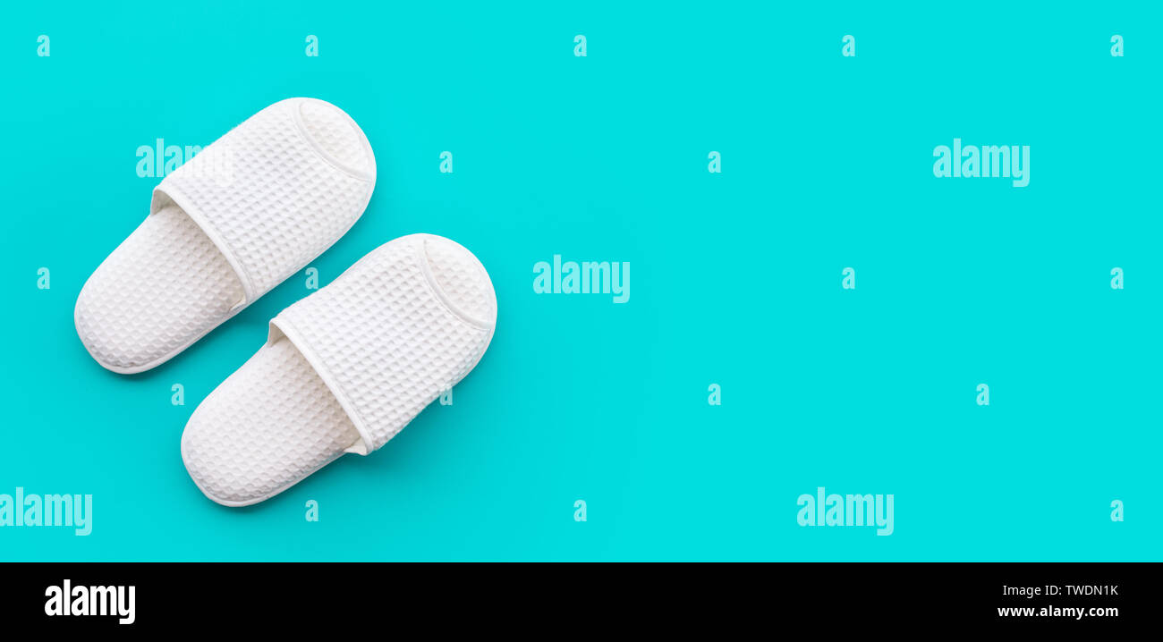 White slippers on color space background.relaxation concepts ideas ...