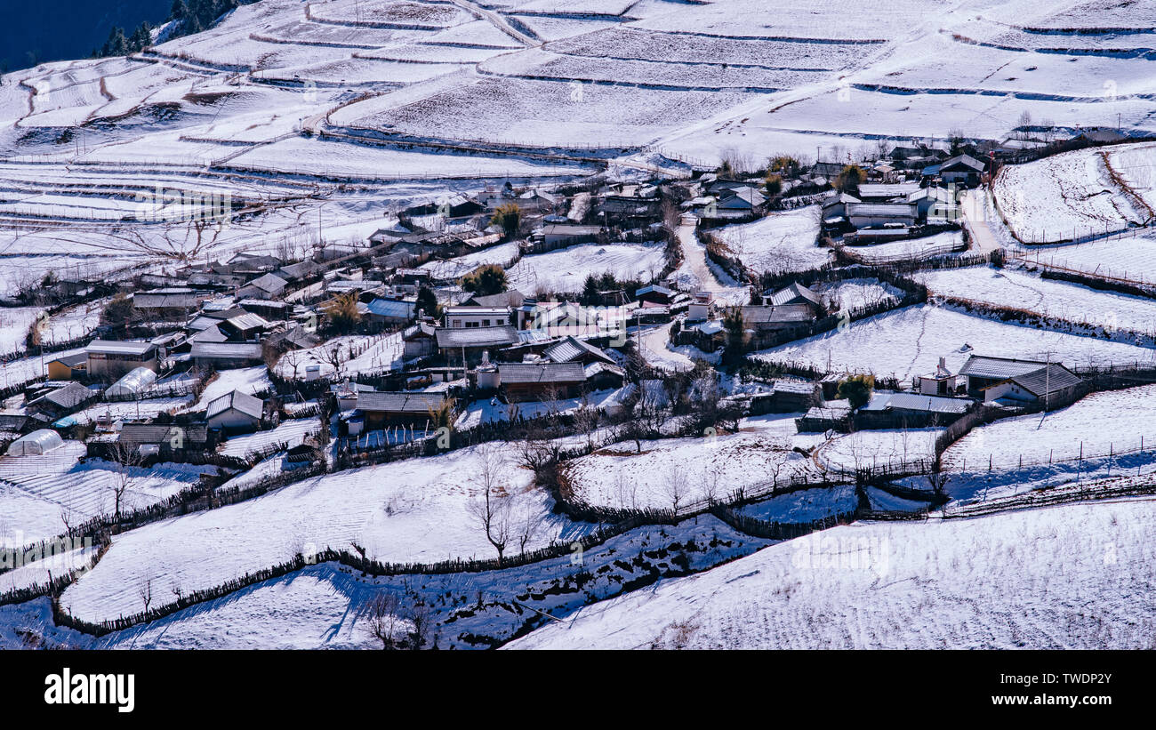 The village under the Haba Snow Mountains Stock Photo - Alamy