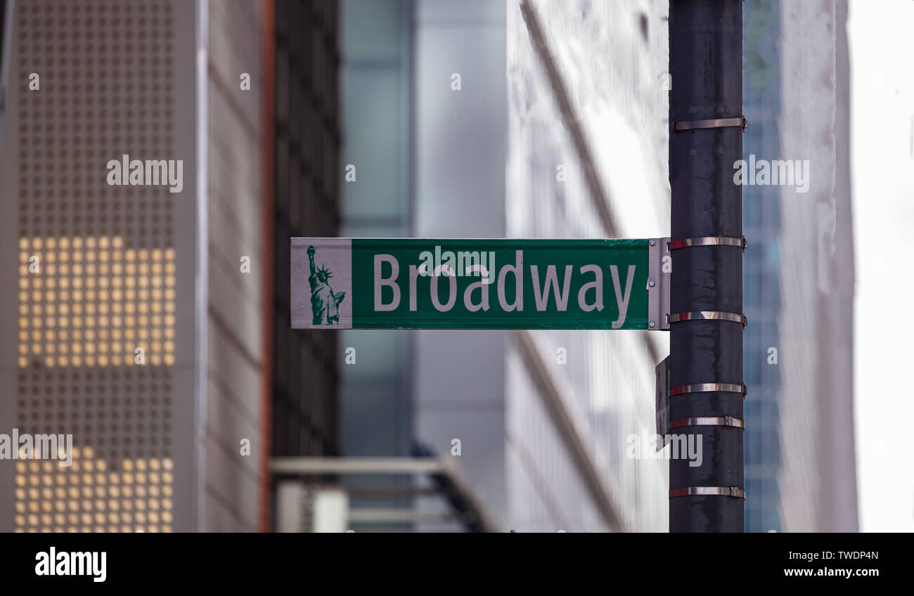 New york, Manhattan, downtown. Broadway street sign. Blur buildings ...