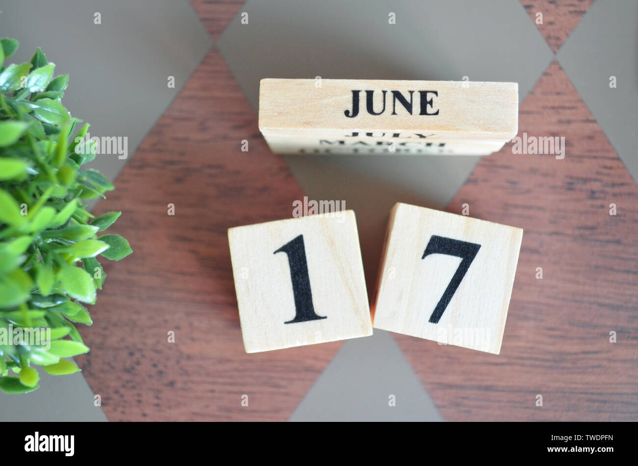 Date of June with leaf on diamond pattern table for background Stock ...